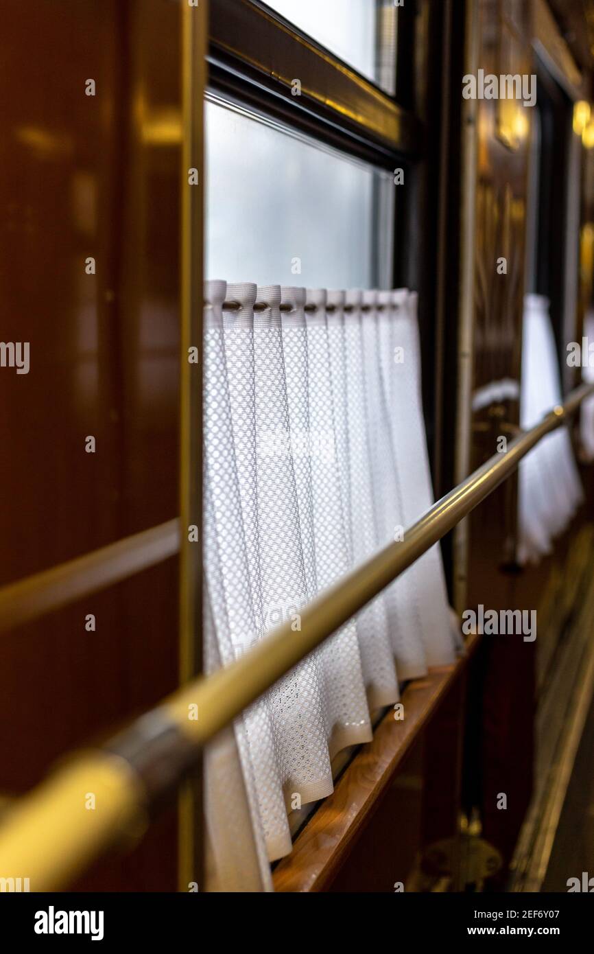 Lace curtains on the window in the train carriage Stock Photo - Alamy