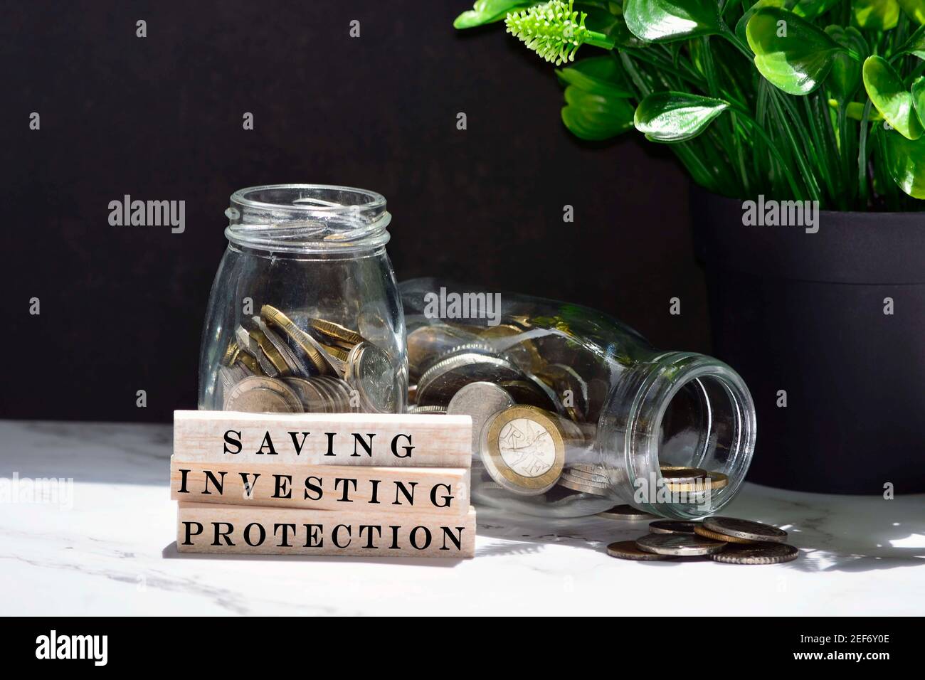 Text on wood block with Australia dollar and European coins on table ...