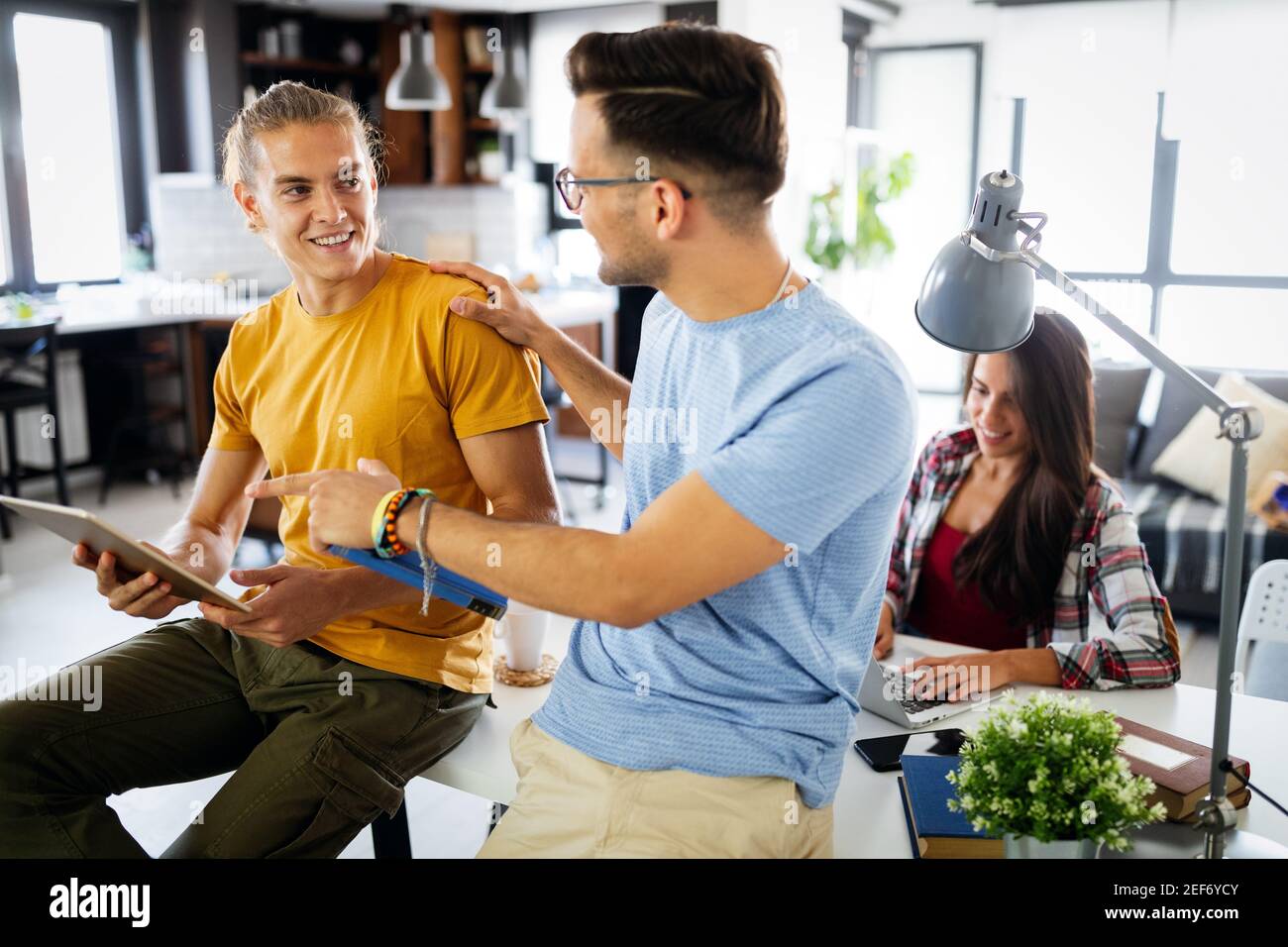 Group of friends, students discussing brainstorming at meeting ...