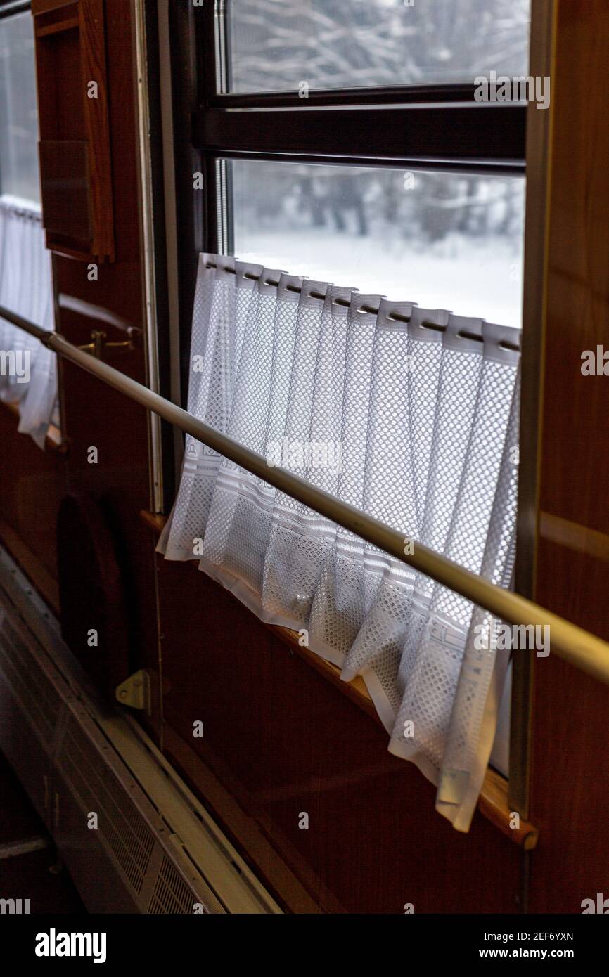 Lace curtains on the window in the train carriage Stock Photo - Alamy
