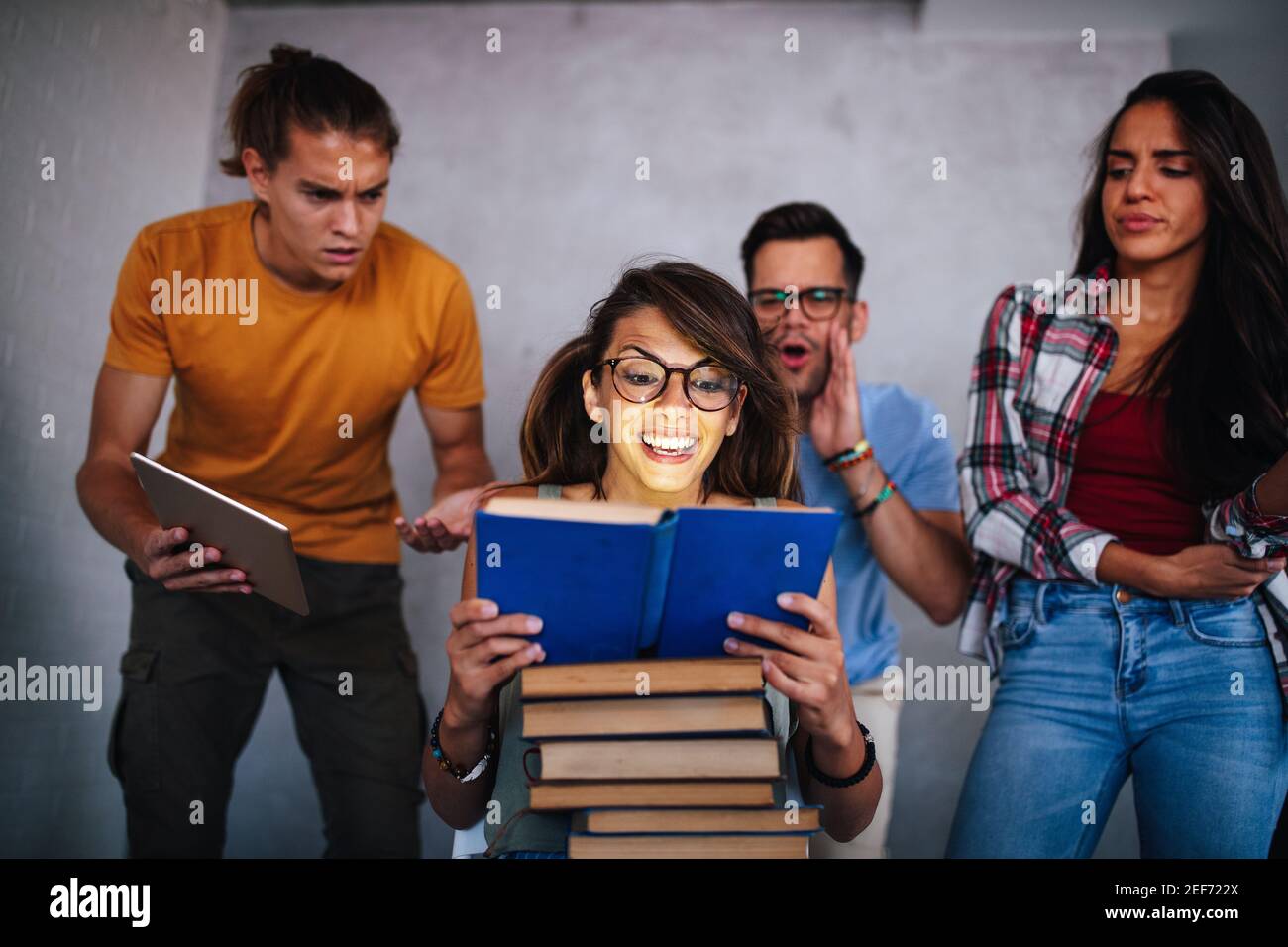 Ready to study hard. Happy nerd woman in library. Book lover Stock ...