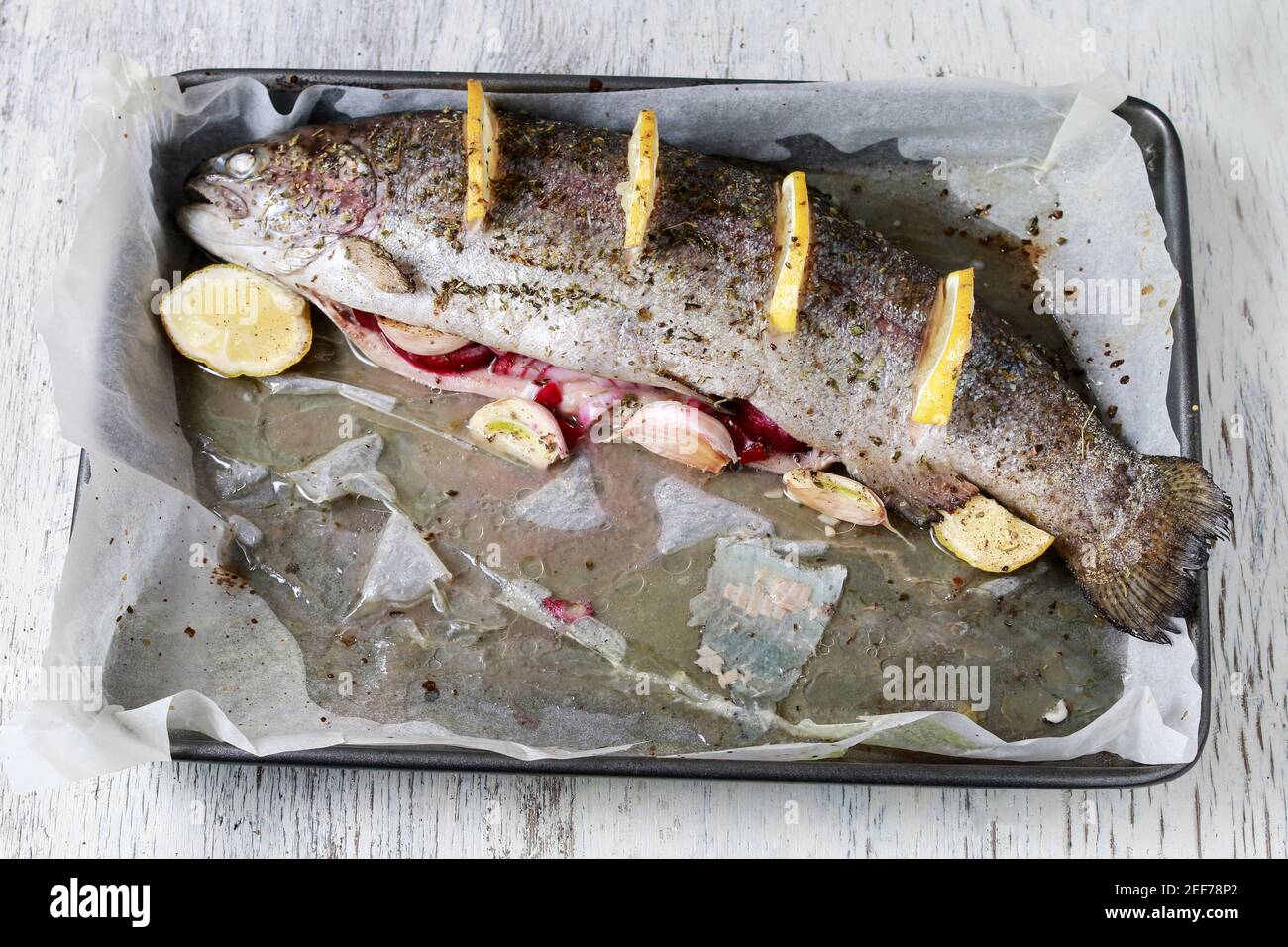 Baked rainbow trout with lemon. Dinner dish Stock Photo - Alamy