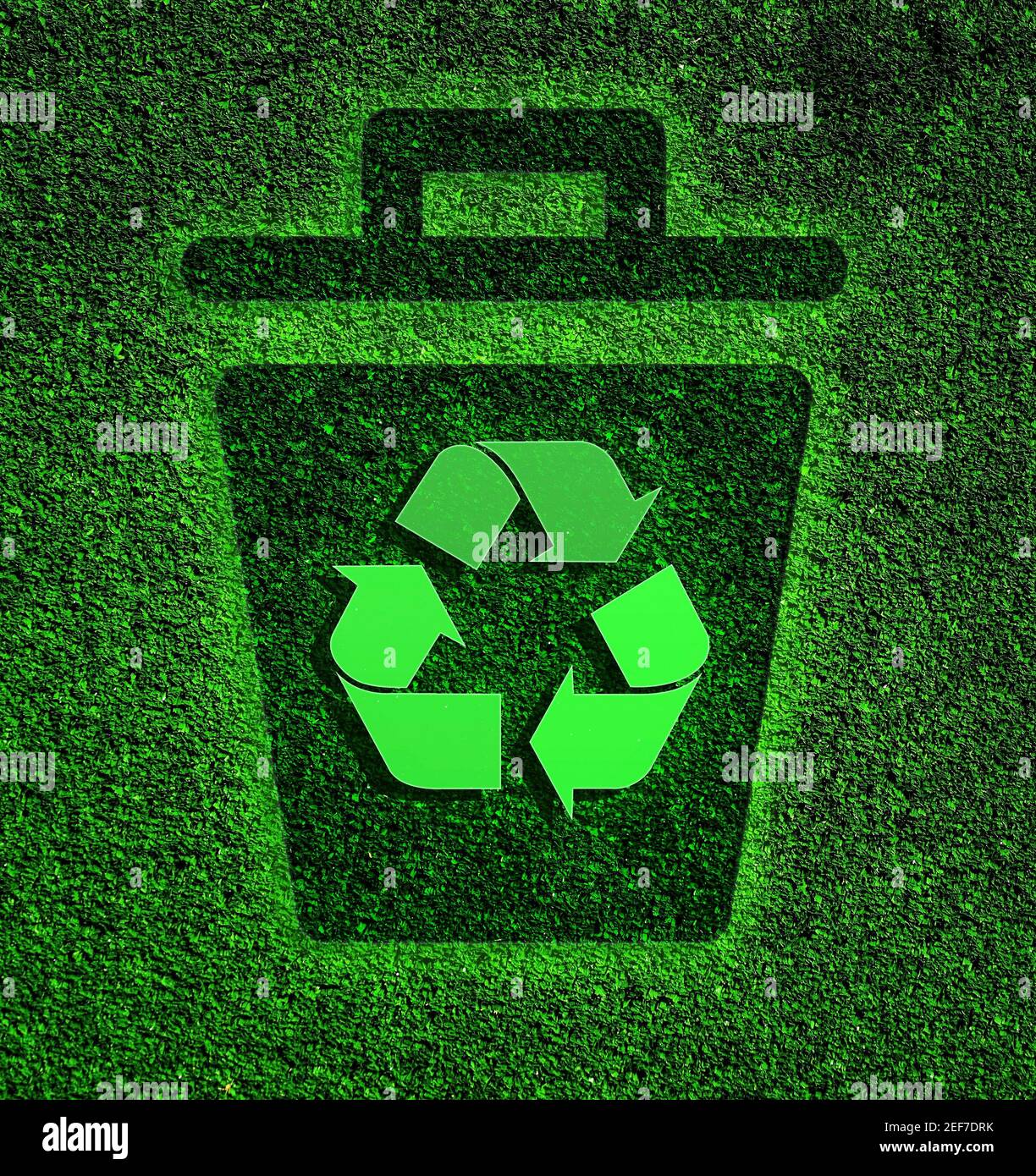 Recycling sign with dustbin on green background Stock Photo - Alamy