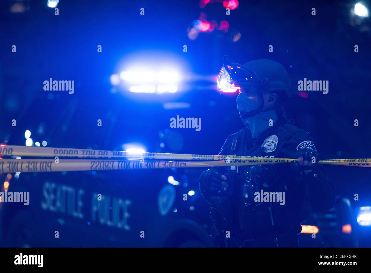 Seattle, USA. 16 Feb, 2021: Late in the evening Seattle police gathered ...