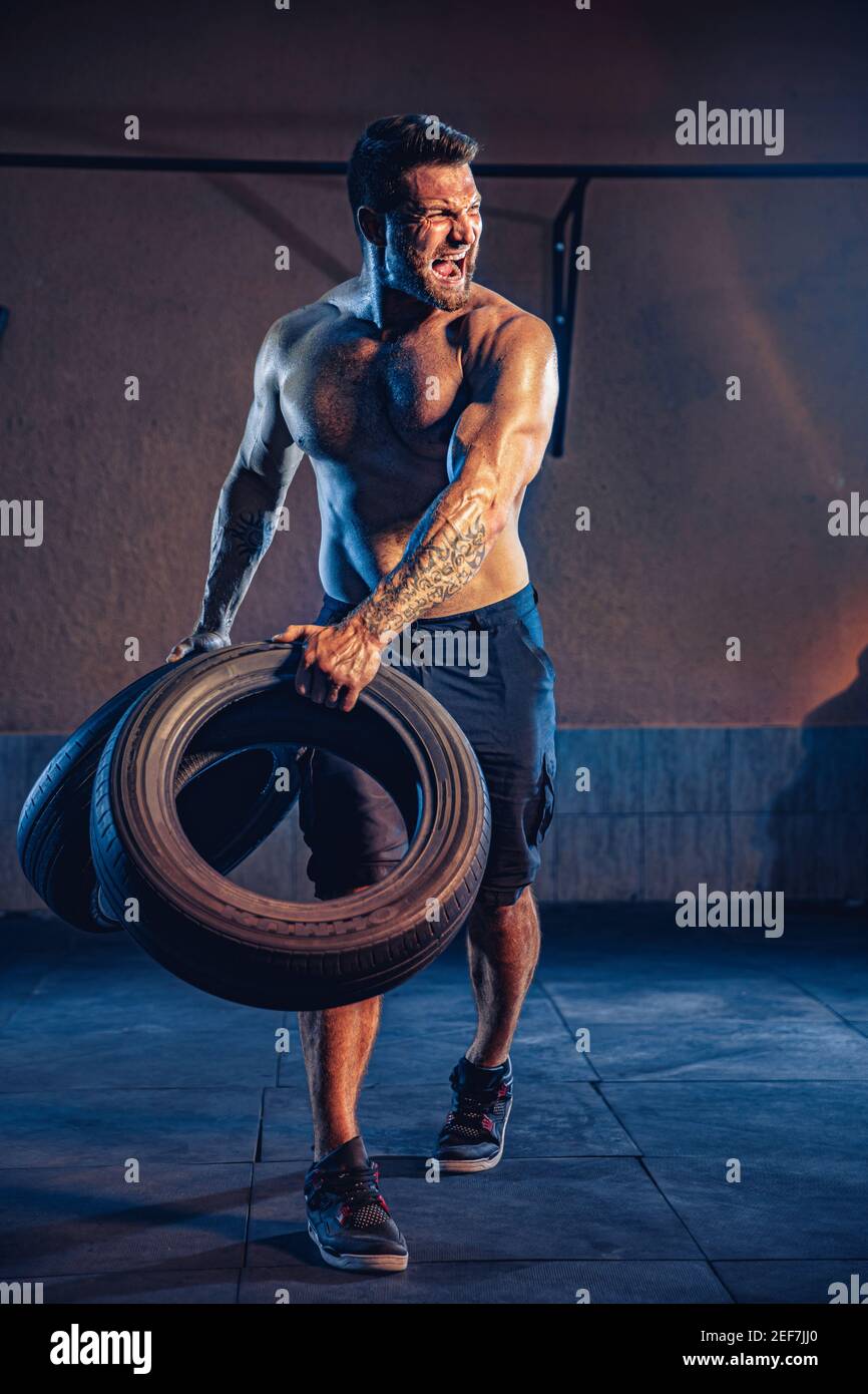 Bodybuilding training, bearded strong sportsman with muscular body ...