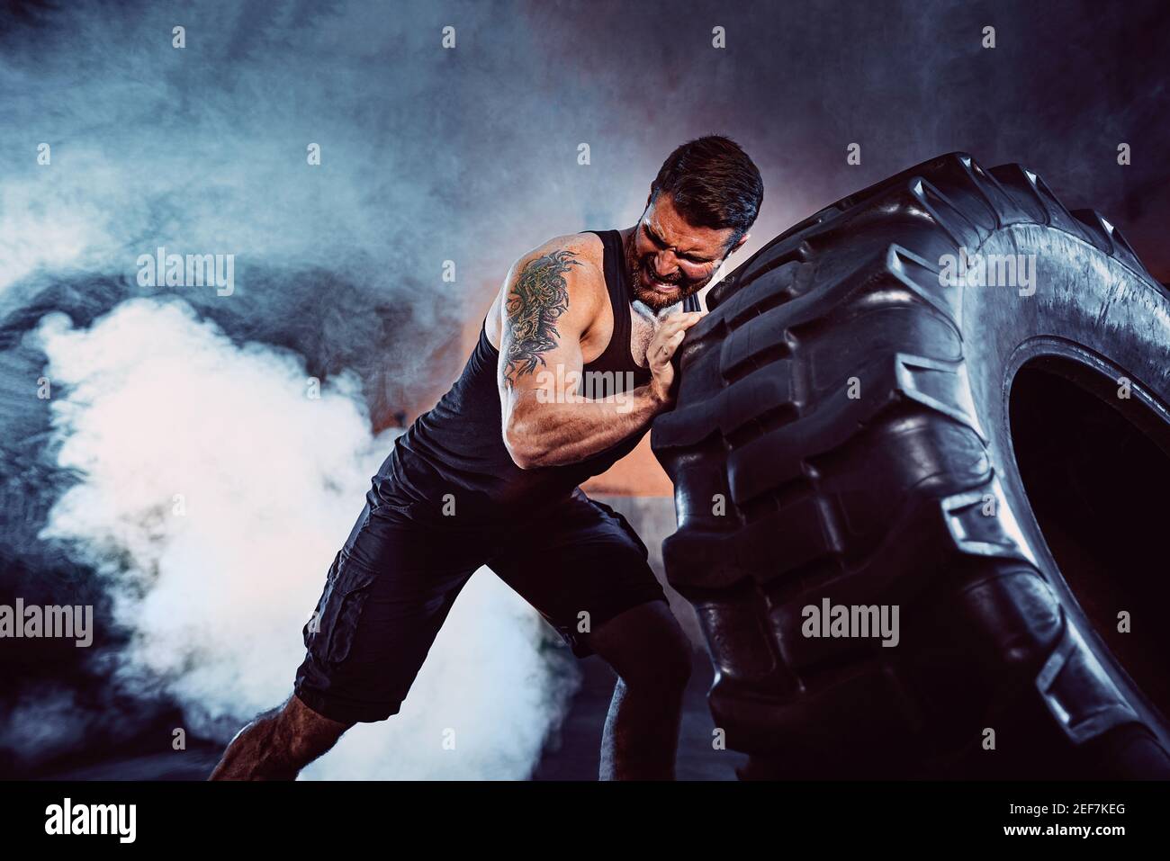 Bodybuilding training, bearded strong sportsman with muscular body ...