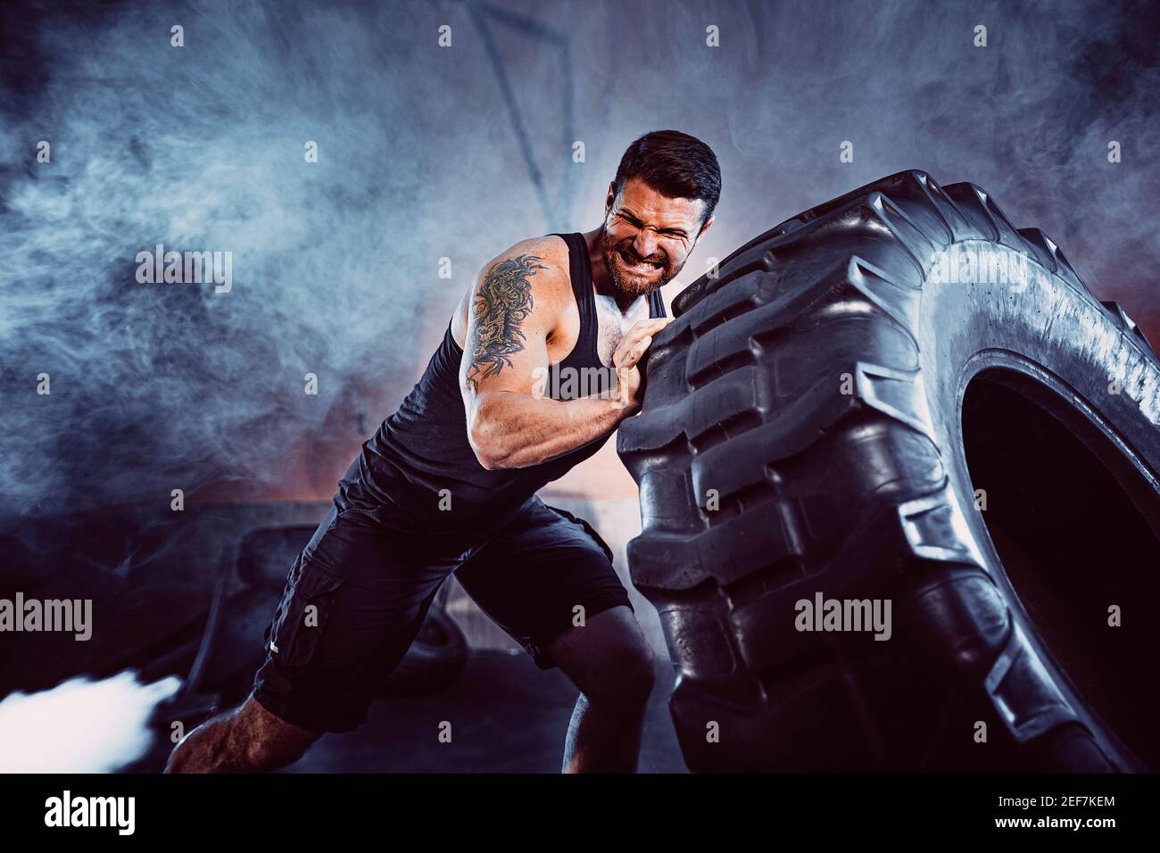 Bodybuilding training, bearded strong sportsman with muscular body ...