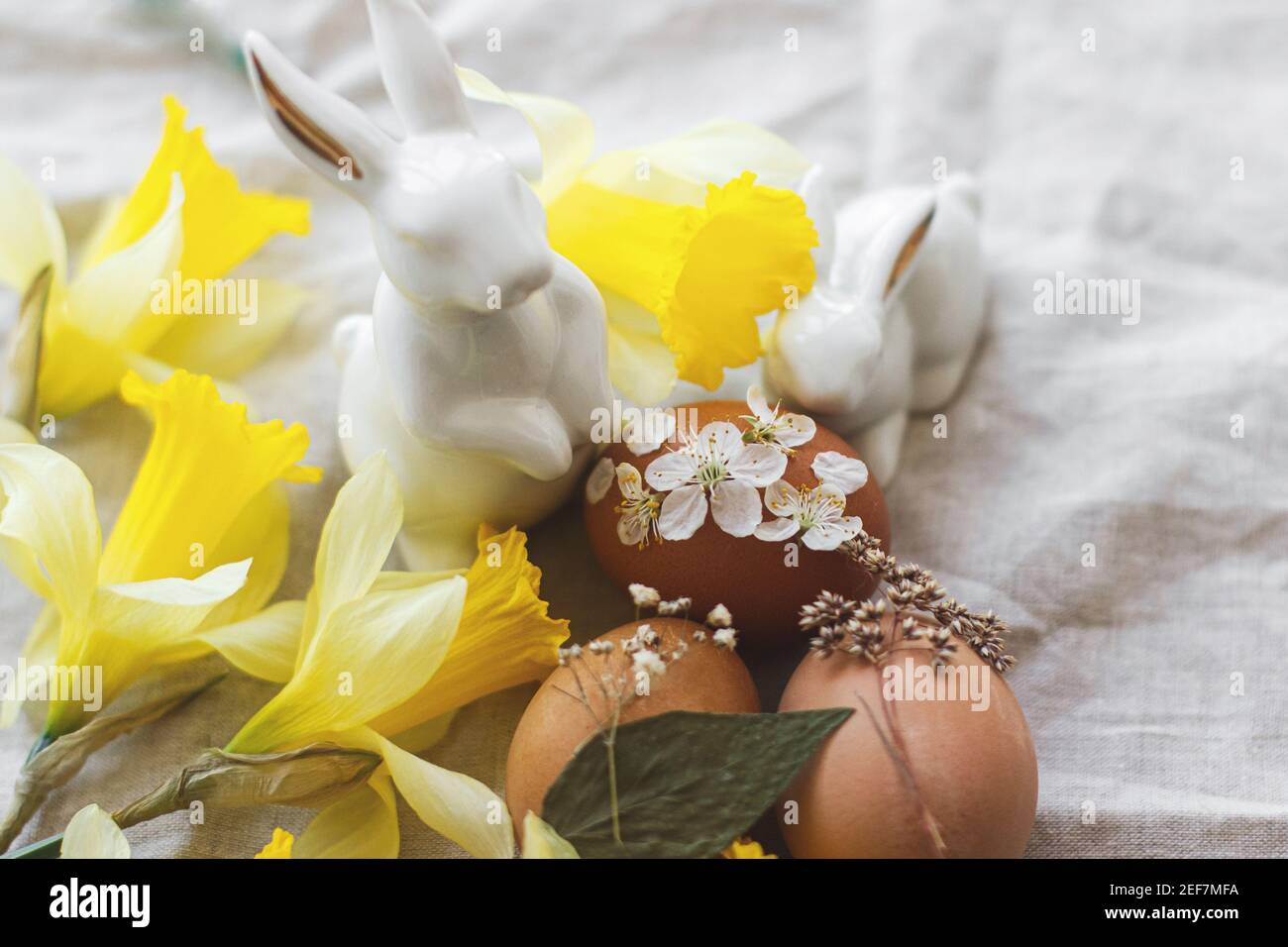 Happy Easter! Stylish Easter eggs decorated with dry flowers and petals ...