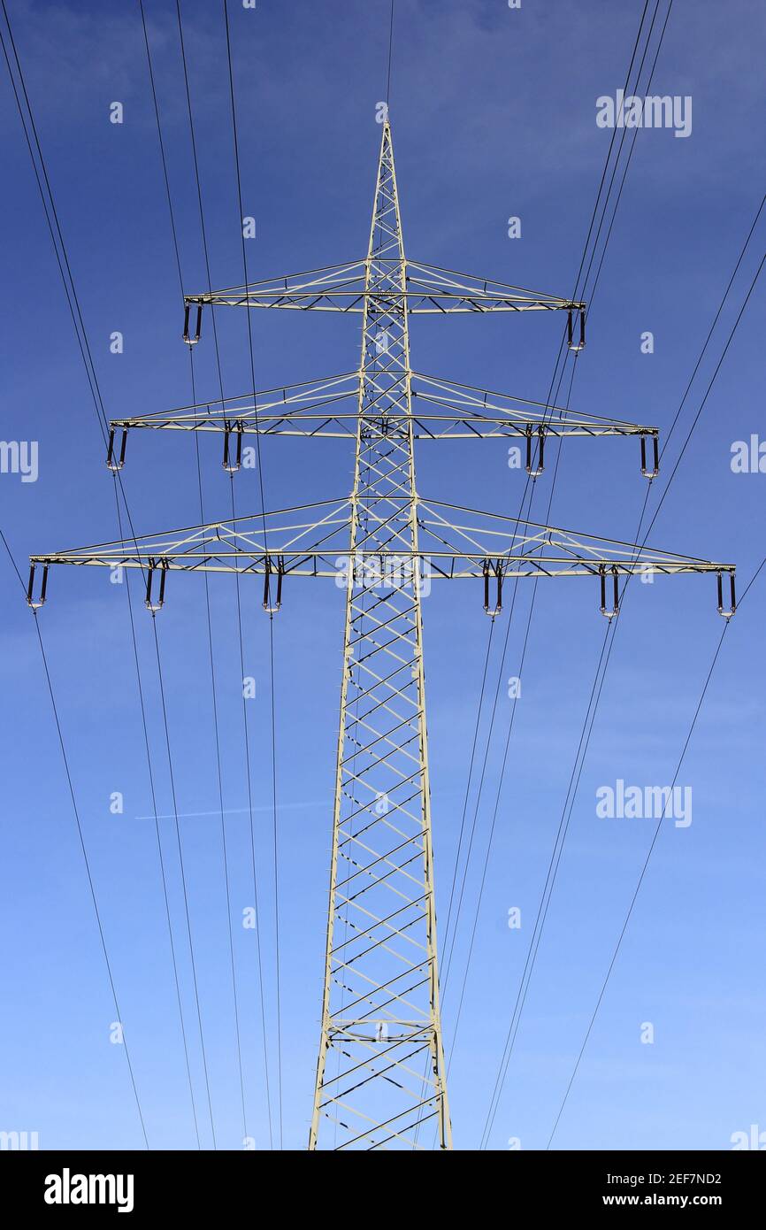 Electricity pylon in the blue sky. Energy transition Environment Stock ...