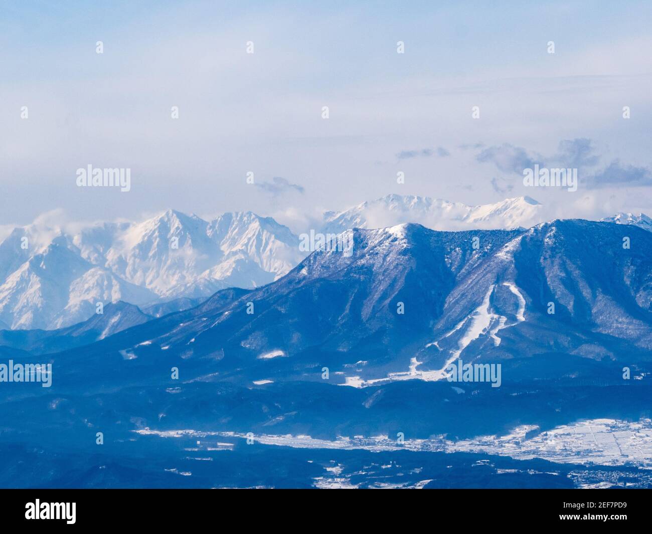 Aerial shot of the Japanese alps seen from the upper area of the Shiga ...