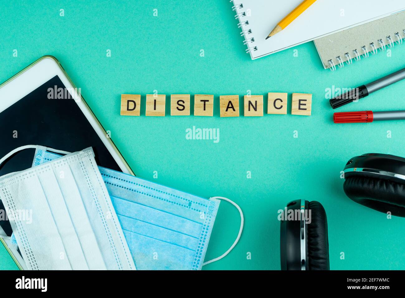 Word distance. The phrase is laid out in wooden letters. Top view ...