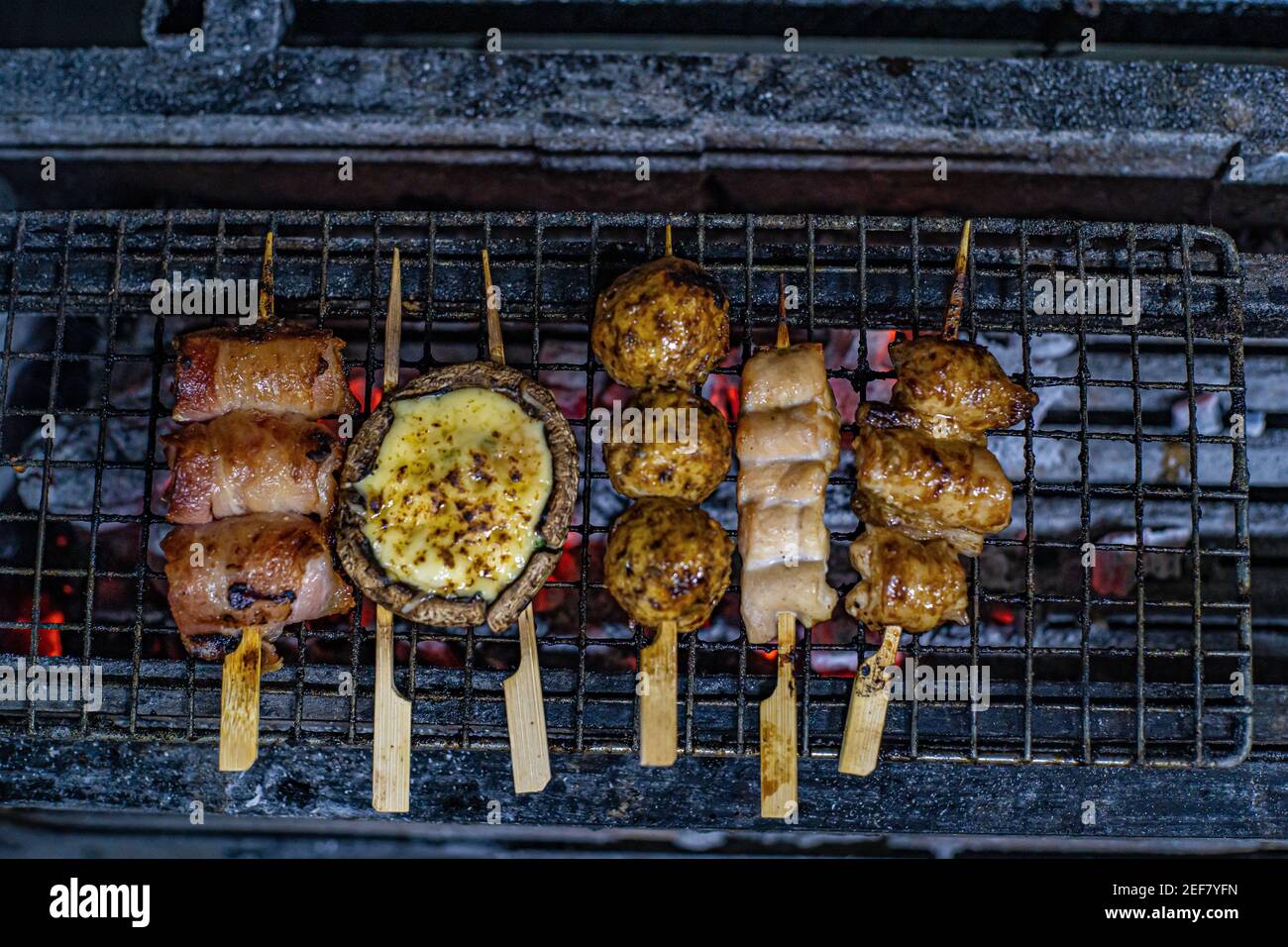 Top view of Japanese street food grilling over charcoal Stock Photo - Alamy