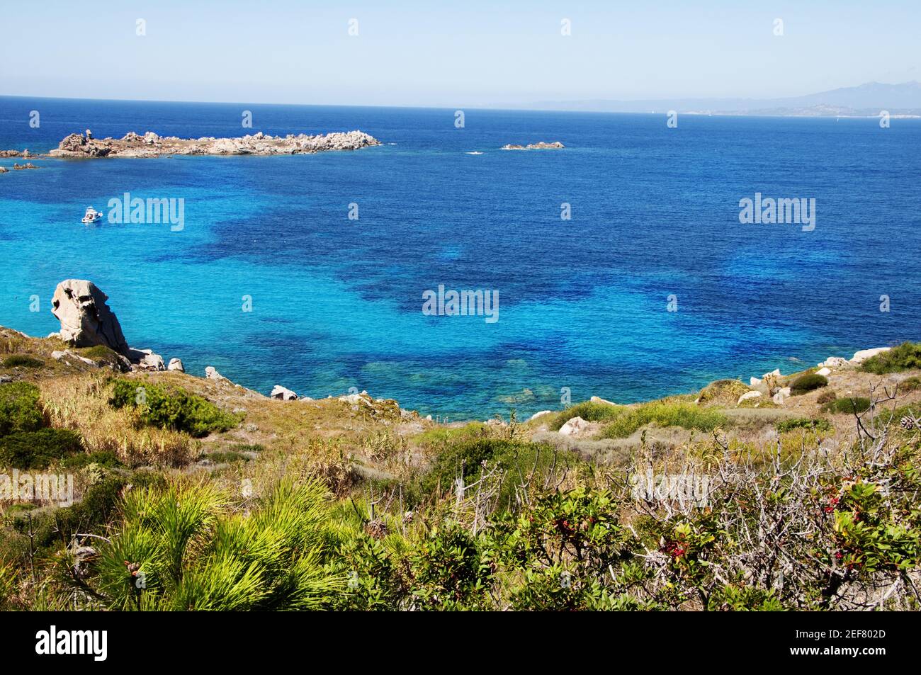 Beautiful shot of the rocky coast of Capo Testa Lighthouse in Sardinia ...