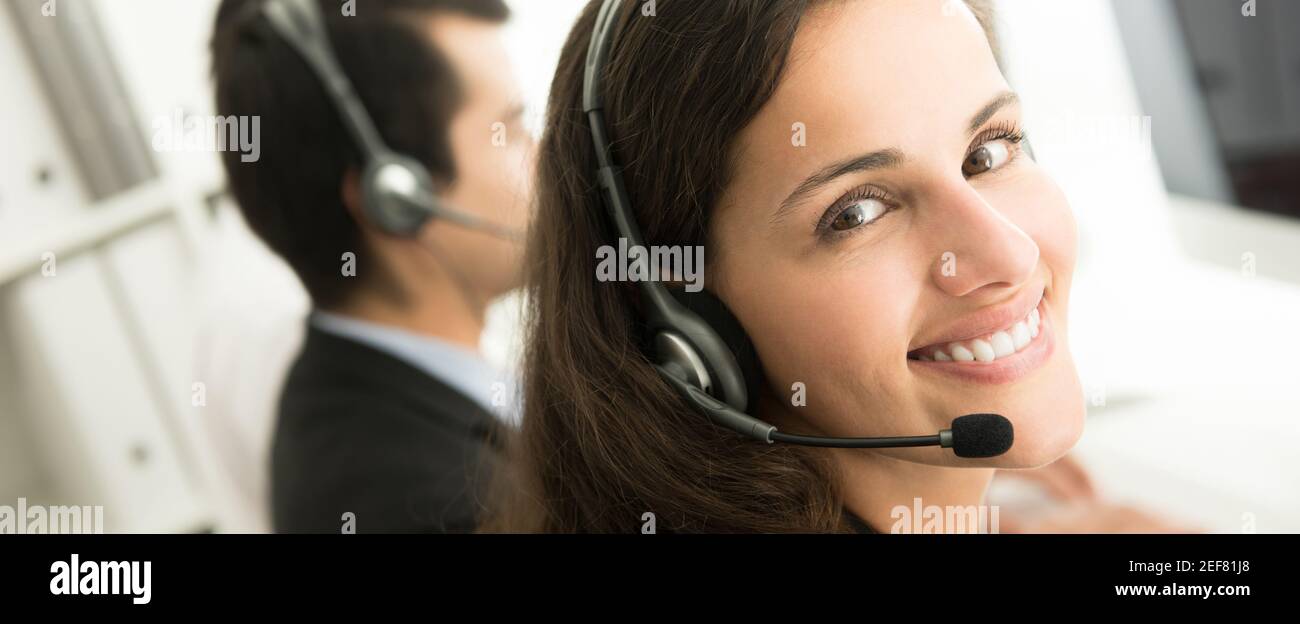 Smiling customer service staff in call center, panoramic banner Stock ...