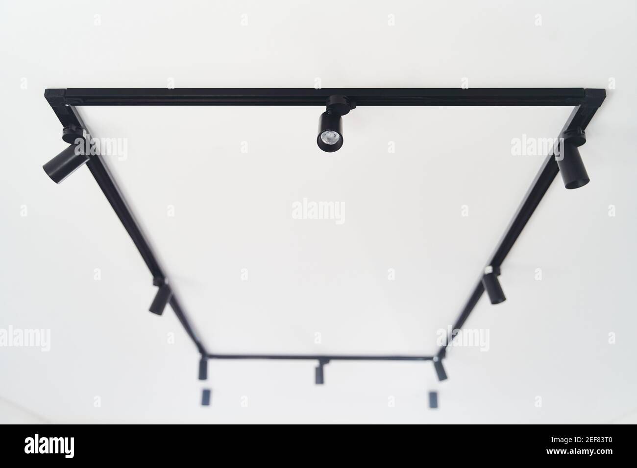 Modern LED black track lights in the interior Stock Photo - Alamy