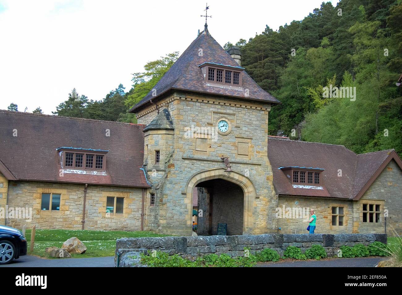 Cragside Northumberland building spire clock arch archway stable ...