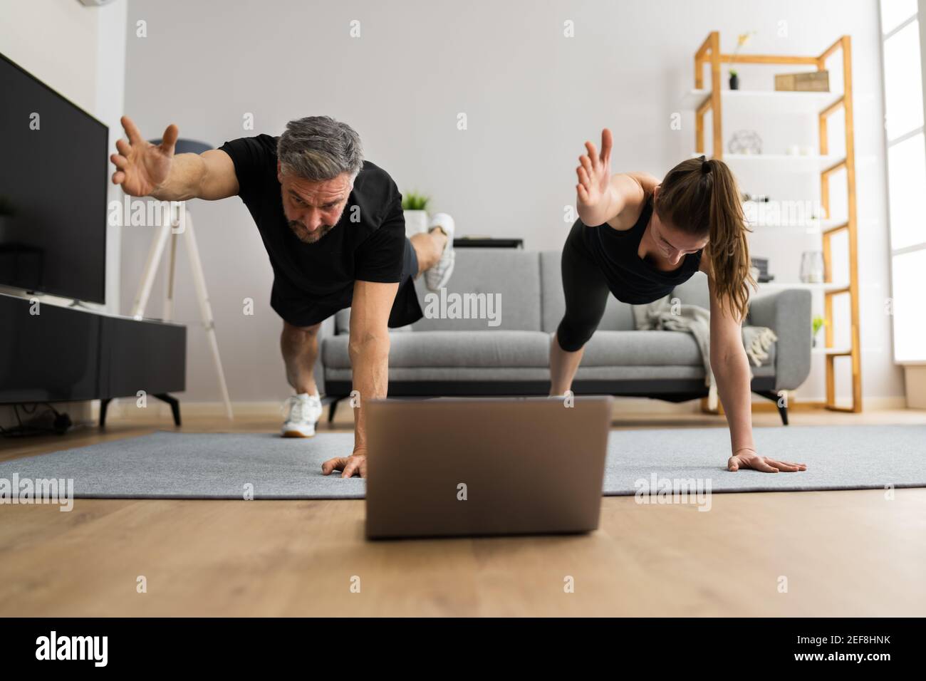 Online Family Gym Class Workout And Fitness Exercise Stock Photo - Alamy