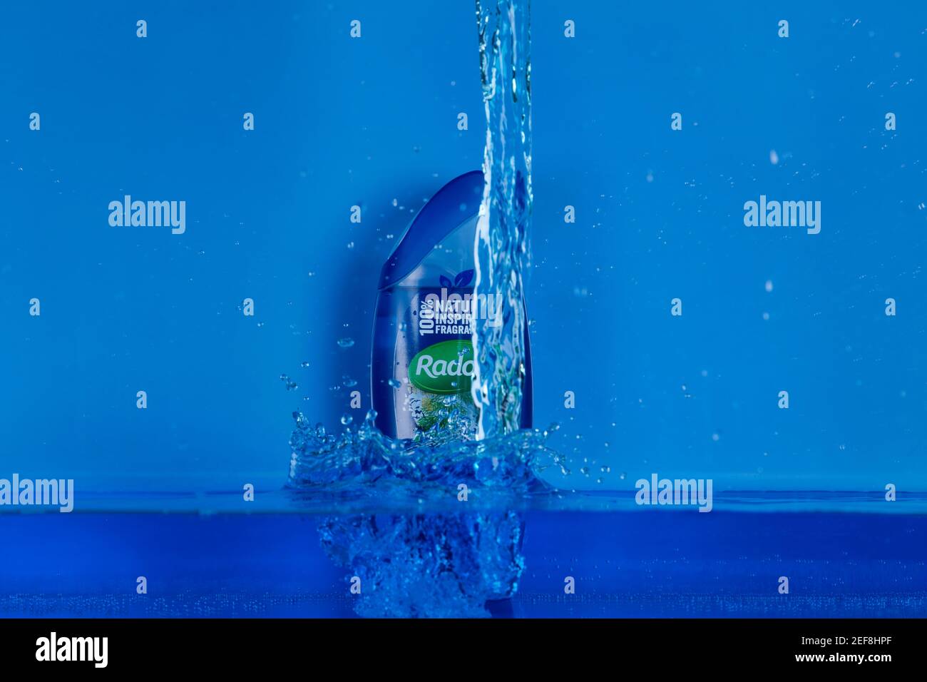 Radox shower gel in blue water against a blue background Stock Photo ...