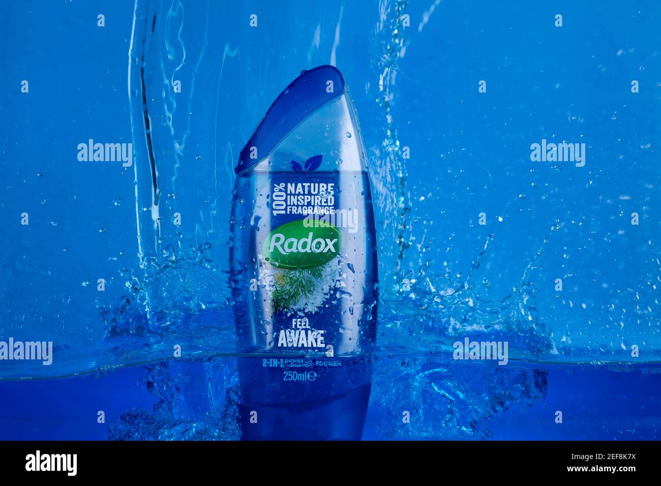 Radox shower gel in blue water against a blue background Stock Photo ...