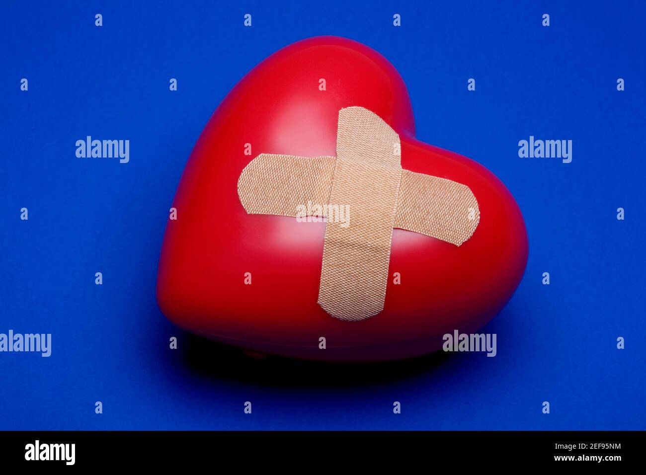 Broken heart with bandage hi-res stock photography and images - Alamy