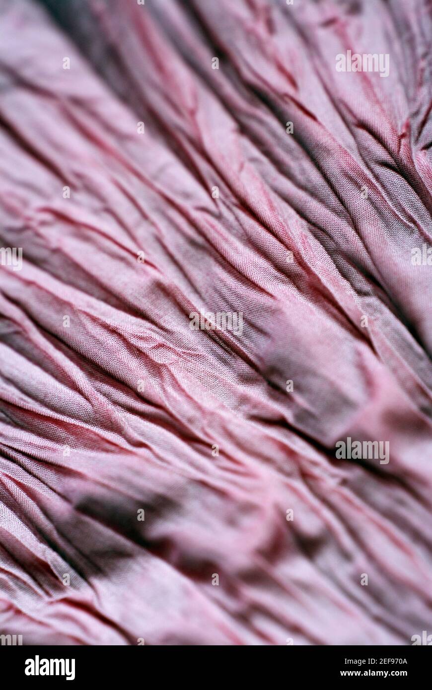 Folds in mottled fabric Stock Photo - Alamy