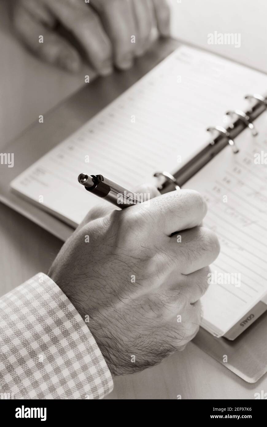 Pen diary finance hand hi-res stock photography and images - Alamy