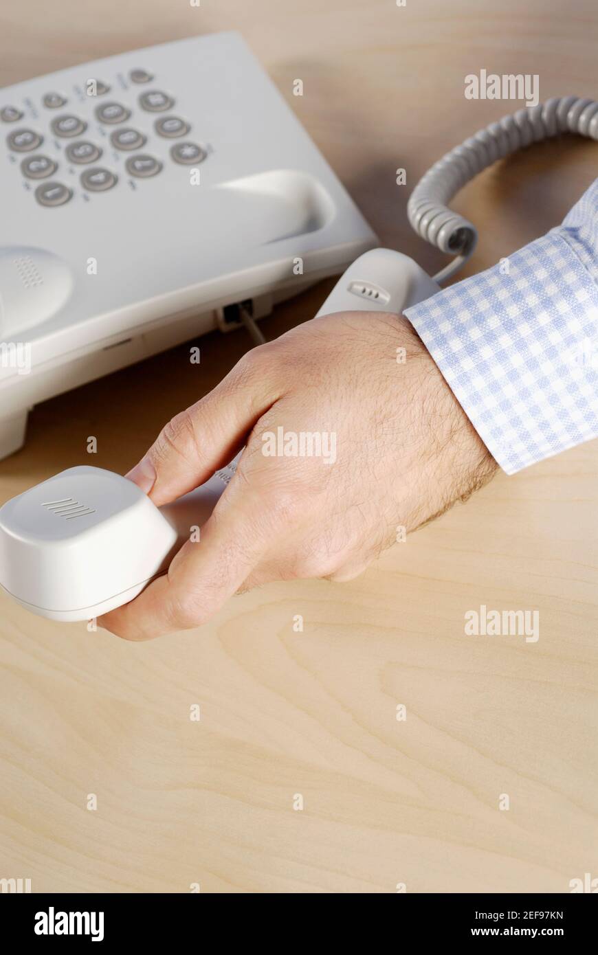 Human hand holding telephone cord hi-res stock photography and images ...