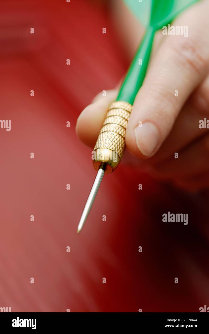 Hand holding dart hi-res stock photography and images - Alamy