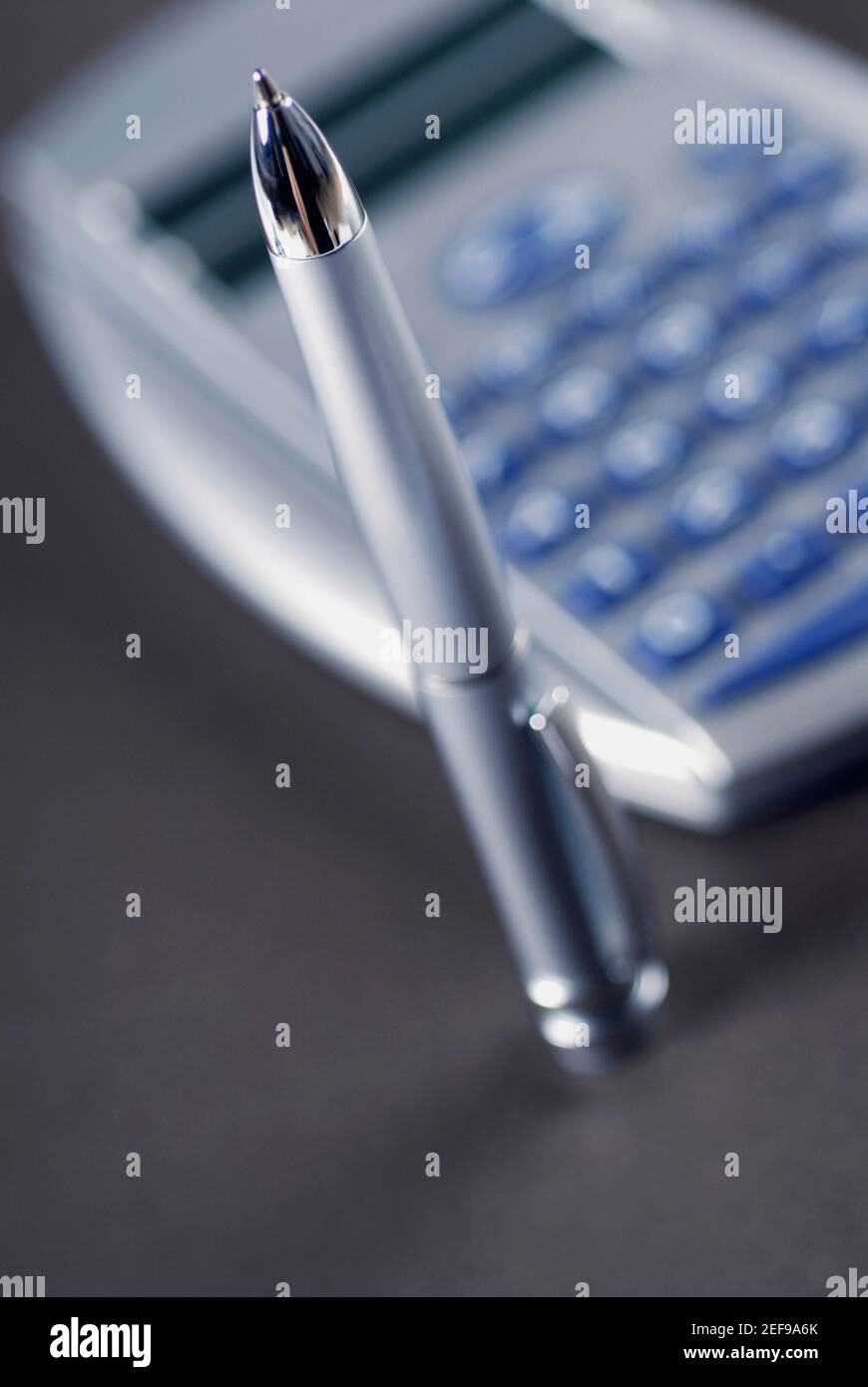 Calculation calculator ball pen hi-res stock photography and images - Alamy