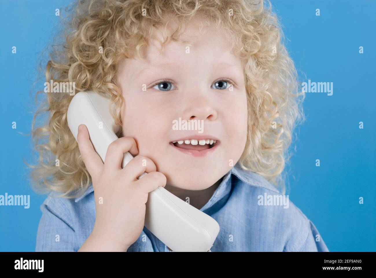 Boy talking on phone landline hi-res stock photography and images - Alamy