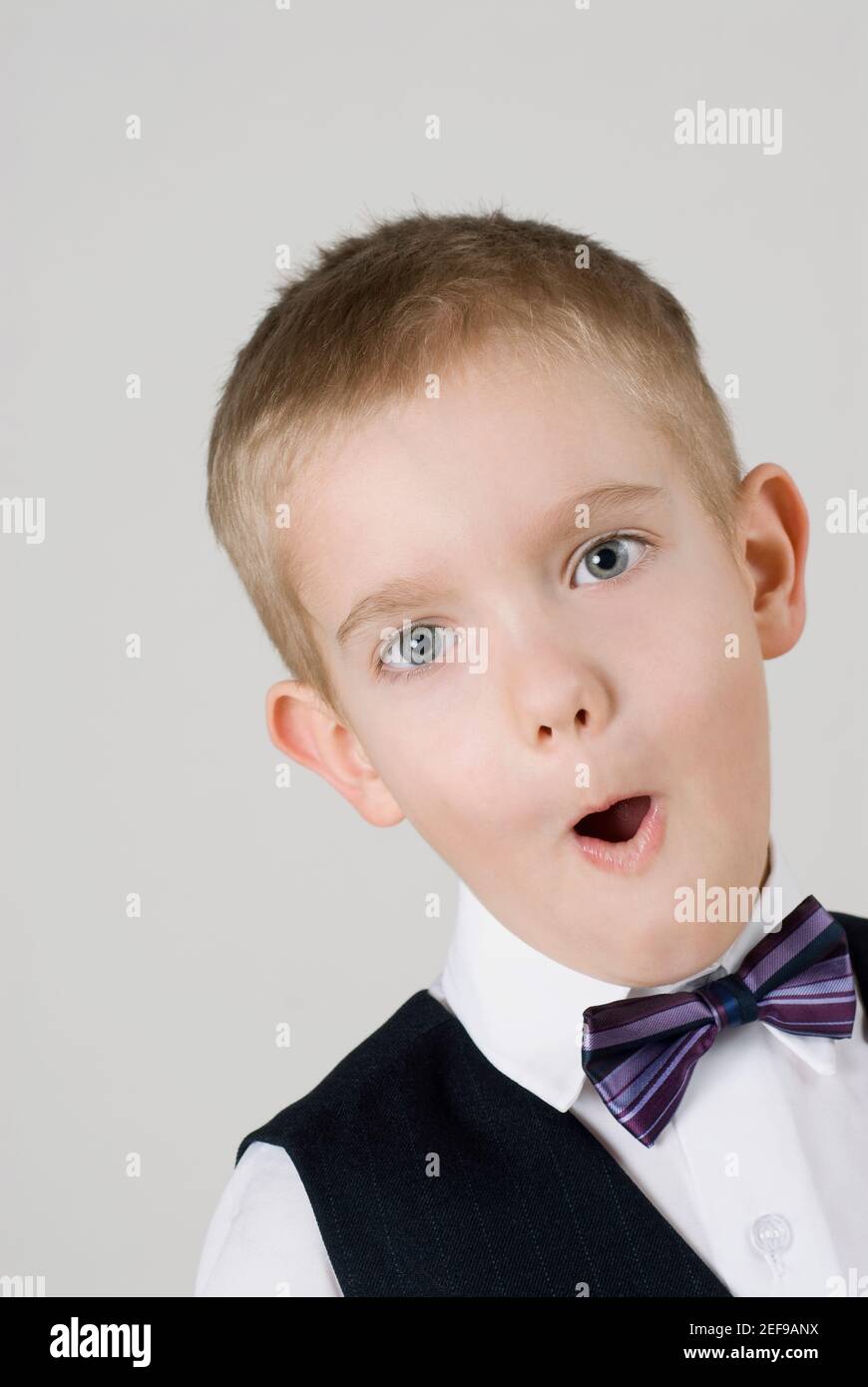 Close up of a boy looking surprised Stock Photo - Alamy