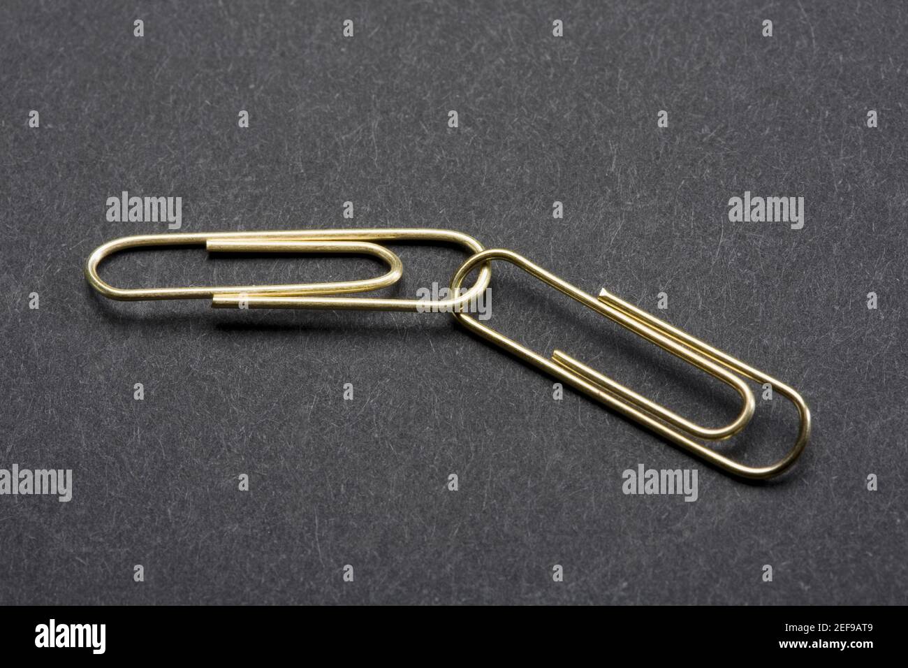 Close up of two paper clips hi-res stock photography and images - Alamy