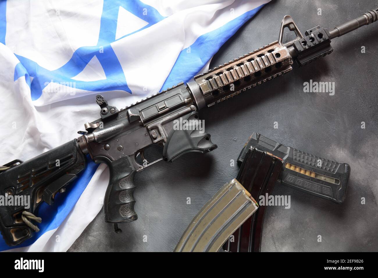 M4 carbine with Israeli flag on the background. Yom Ha'atzmaut ...