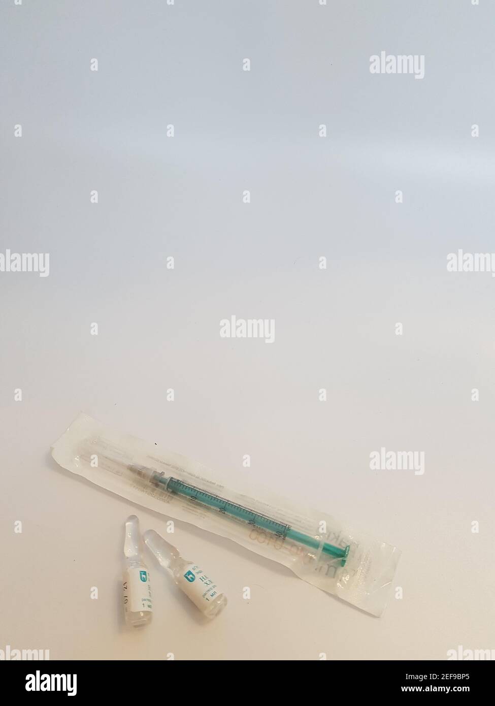 Medicine bottle for injection. Medical glass vials and syringe for ...