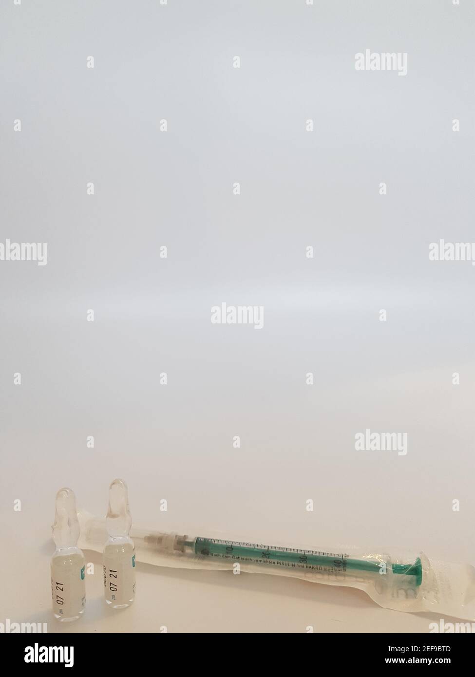 Medicine bottle for injection. Medical glass vials and syringe for ...