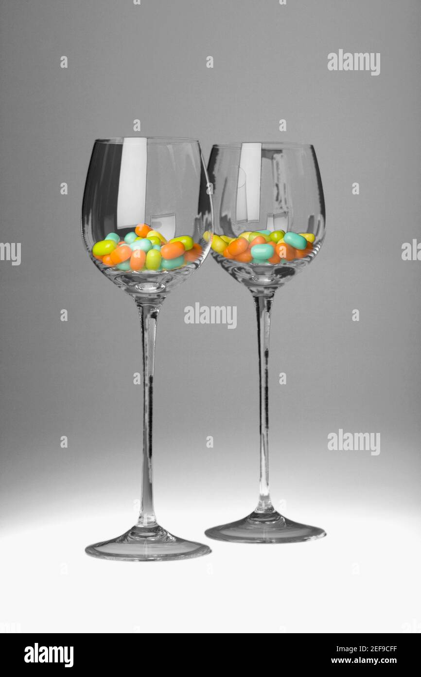 Candy in two stem glasses Stock Photo - Alamy
