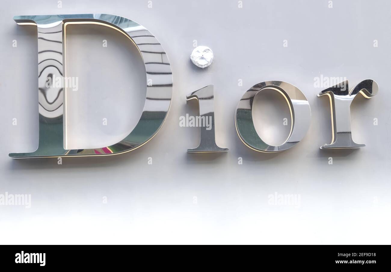 Silver logo of a Dior shop Stock Photo - Alamy
