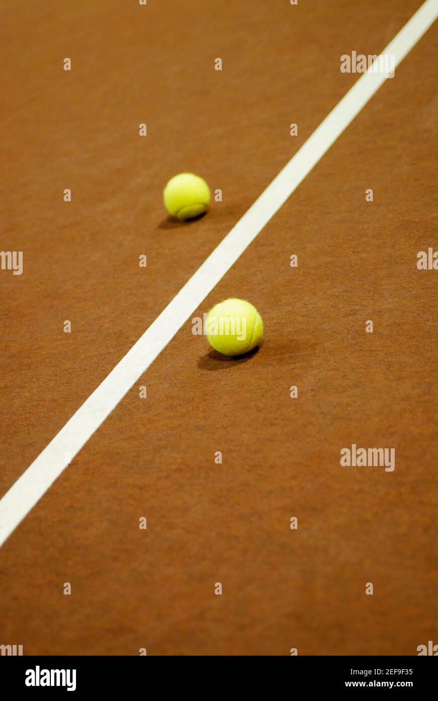 Close-up of a yard line between two tennis balls Stock Photo - Alamy