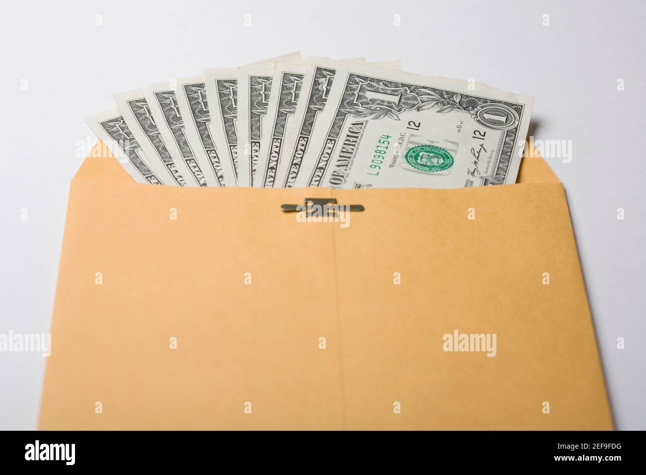Us dollar bills in envelope hi-res stock photography and images - Alamy