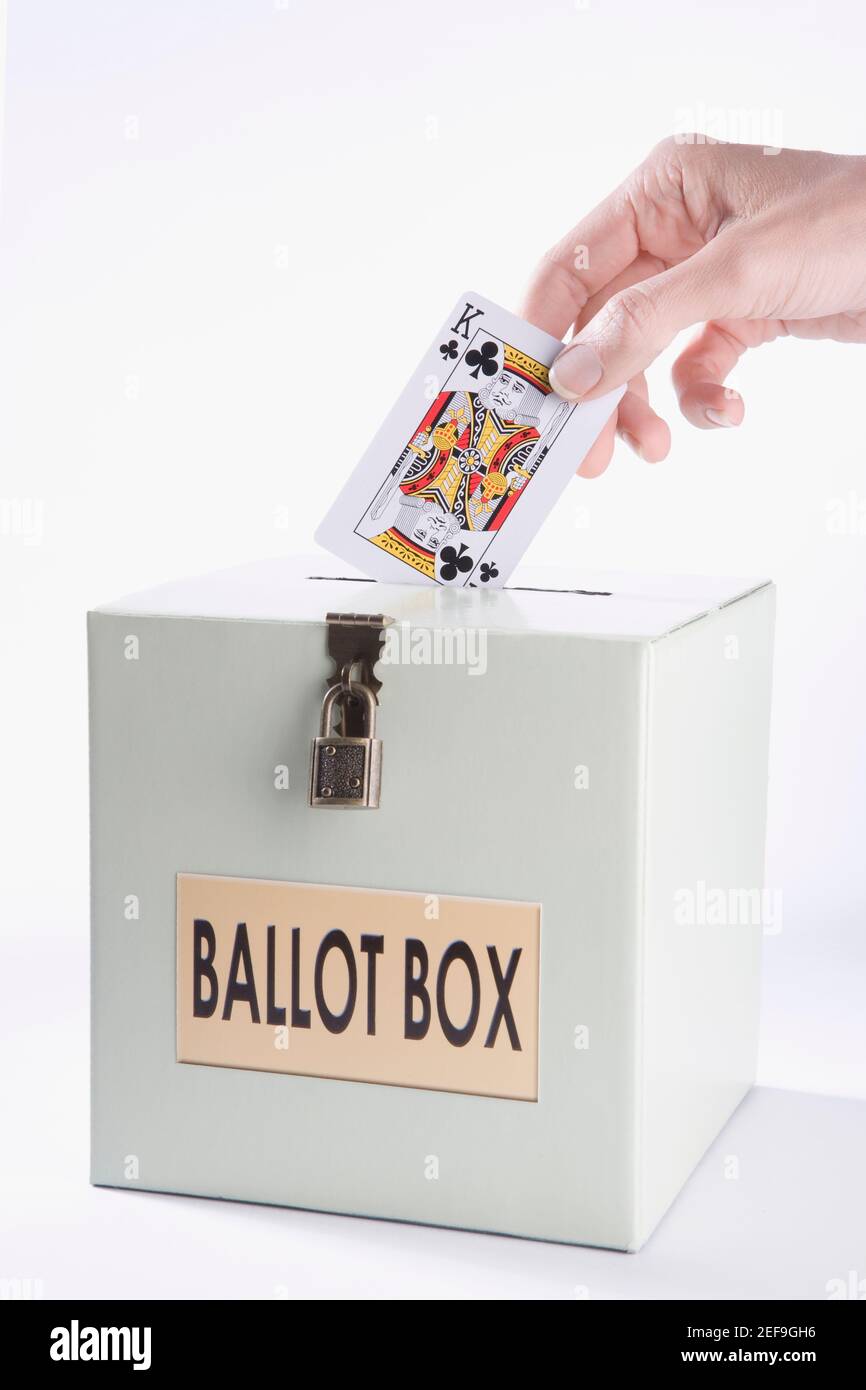 Human hand inserting voting hi-res stock photography and images - Alamy