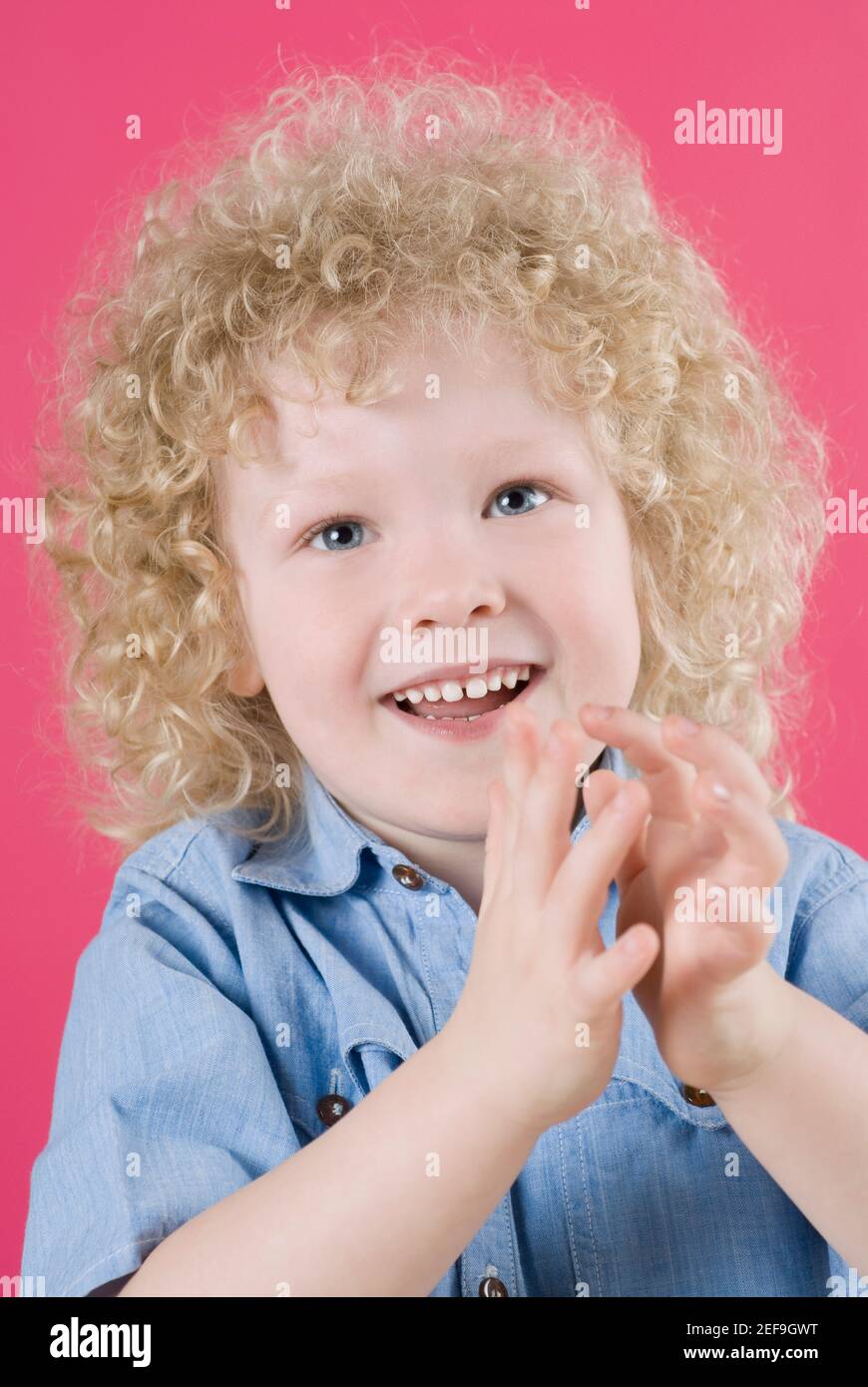 Close up of a boy clapping Stock Photo - Alamy