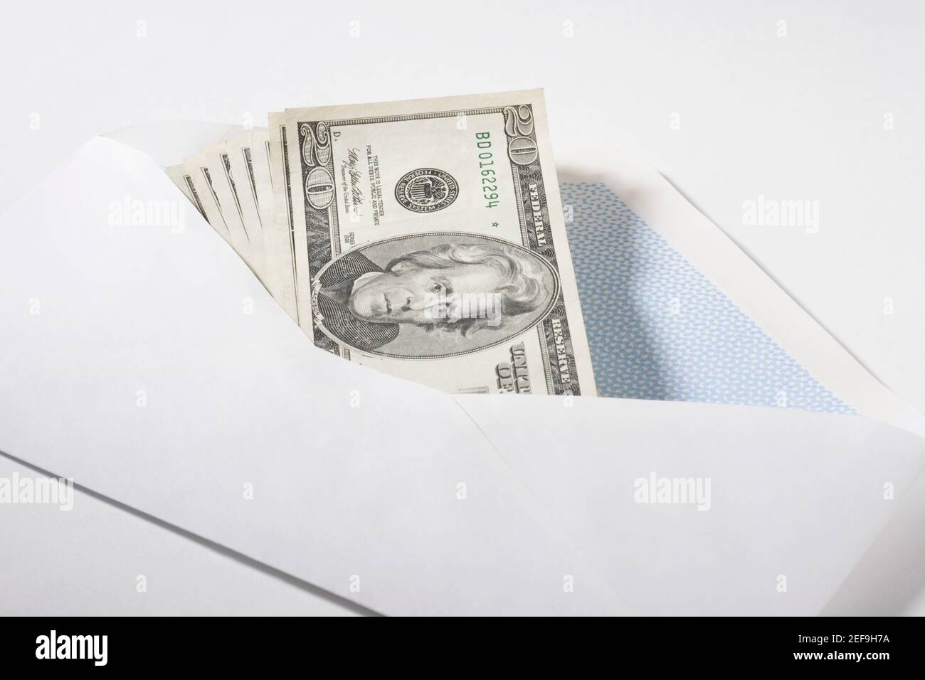 Us dollar bills in envelope hi-res stock photography and images - Alamy