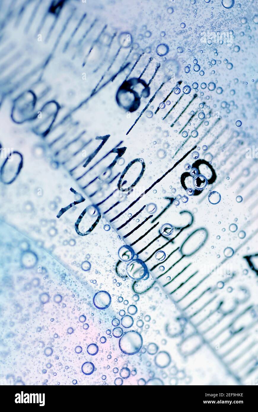 Close-up of a protractor and a ruler in water Stock Photo - Alamy