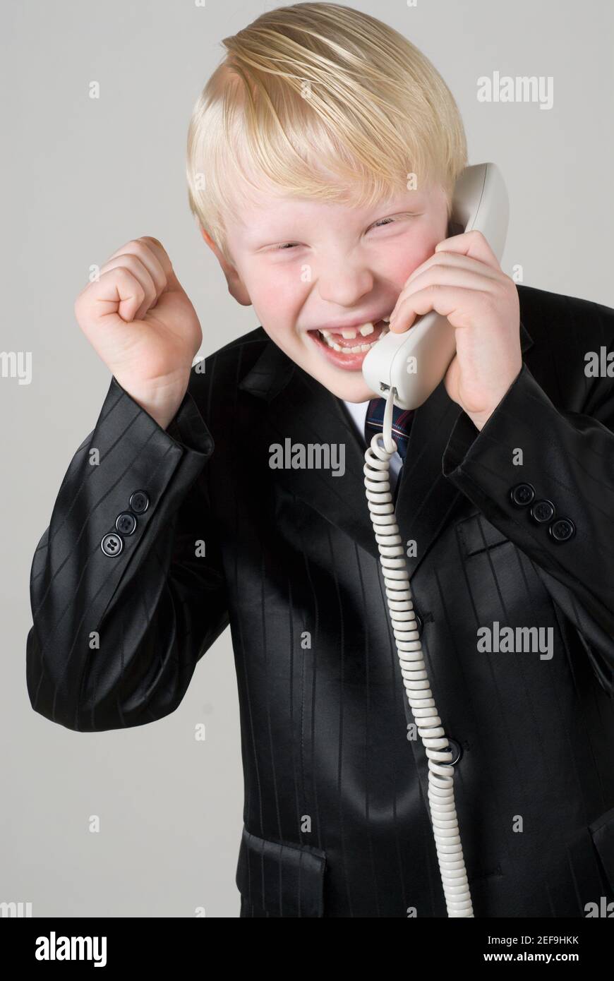 Boy talking on phone landline hi-res stock photography and images - Alamy