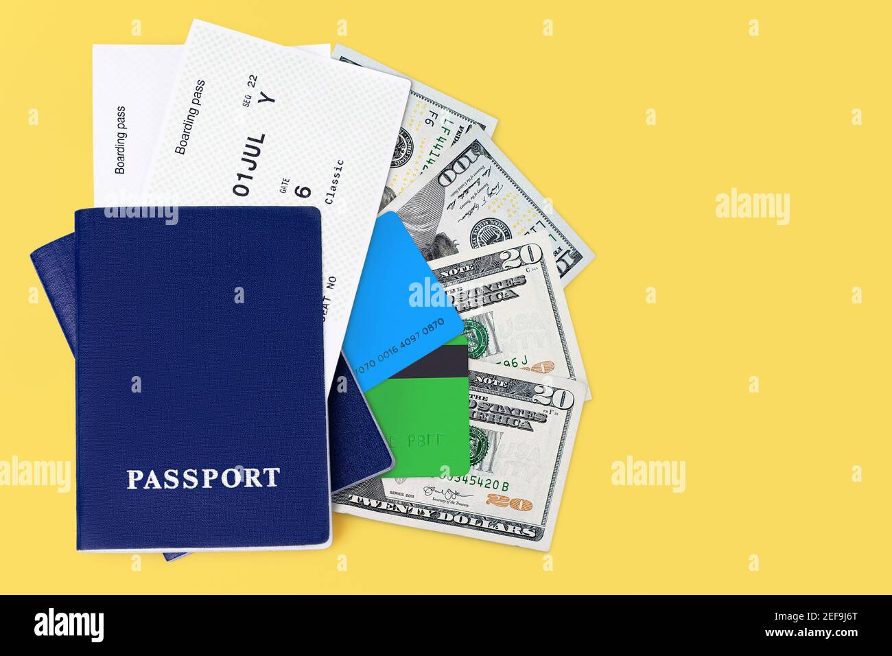 Blue passport, boarding pass, flight ticket, usa dollars, us cash money ...