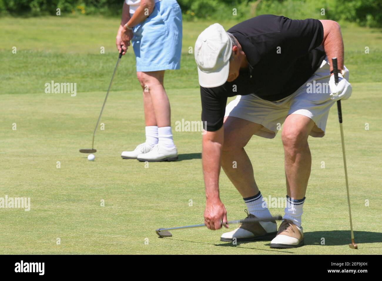 Two men playing golf hi-res stock photography and images - Alamy