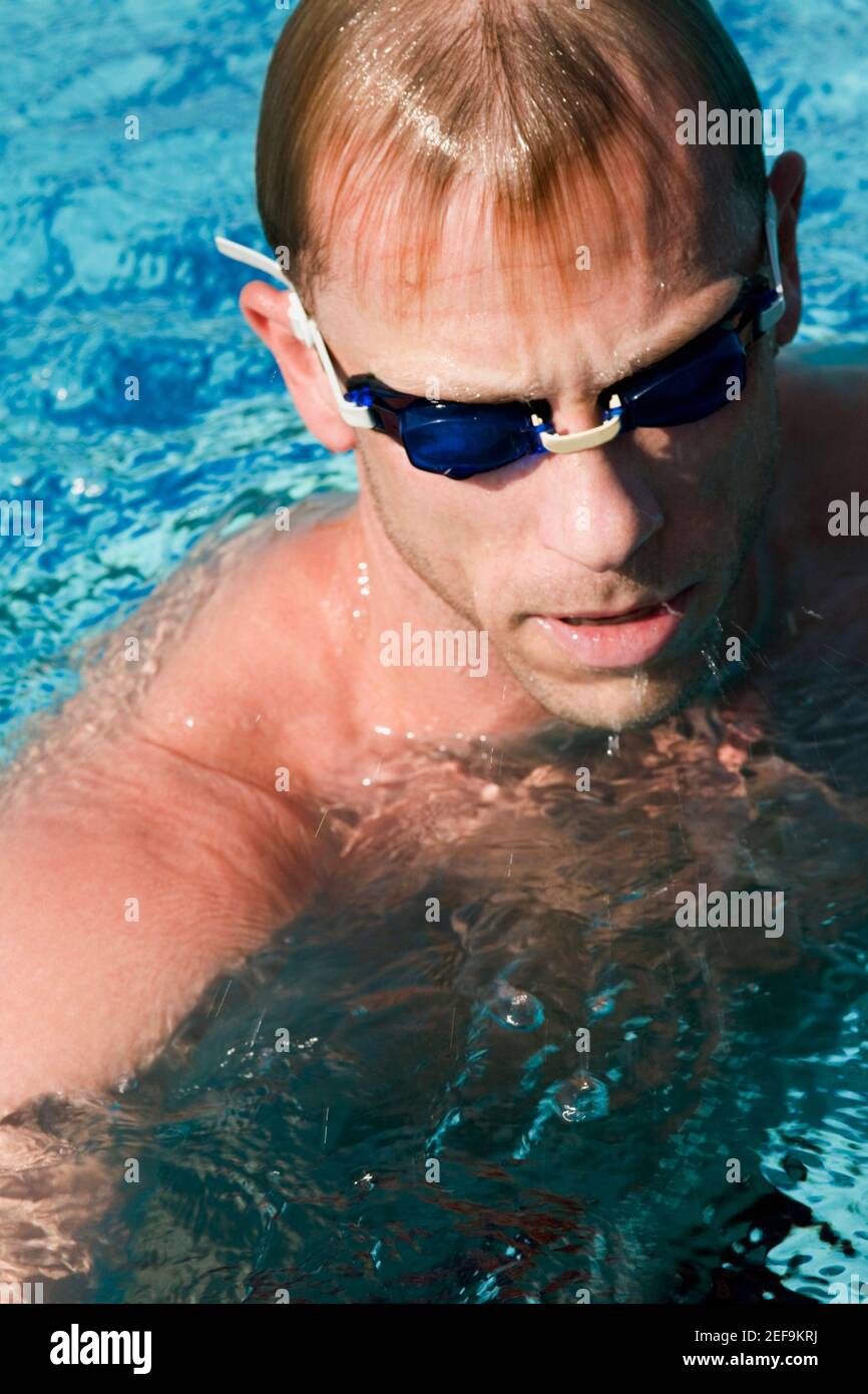 Close-up of a mid adult man in a swimming pool Stock Photo - Alamy