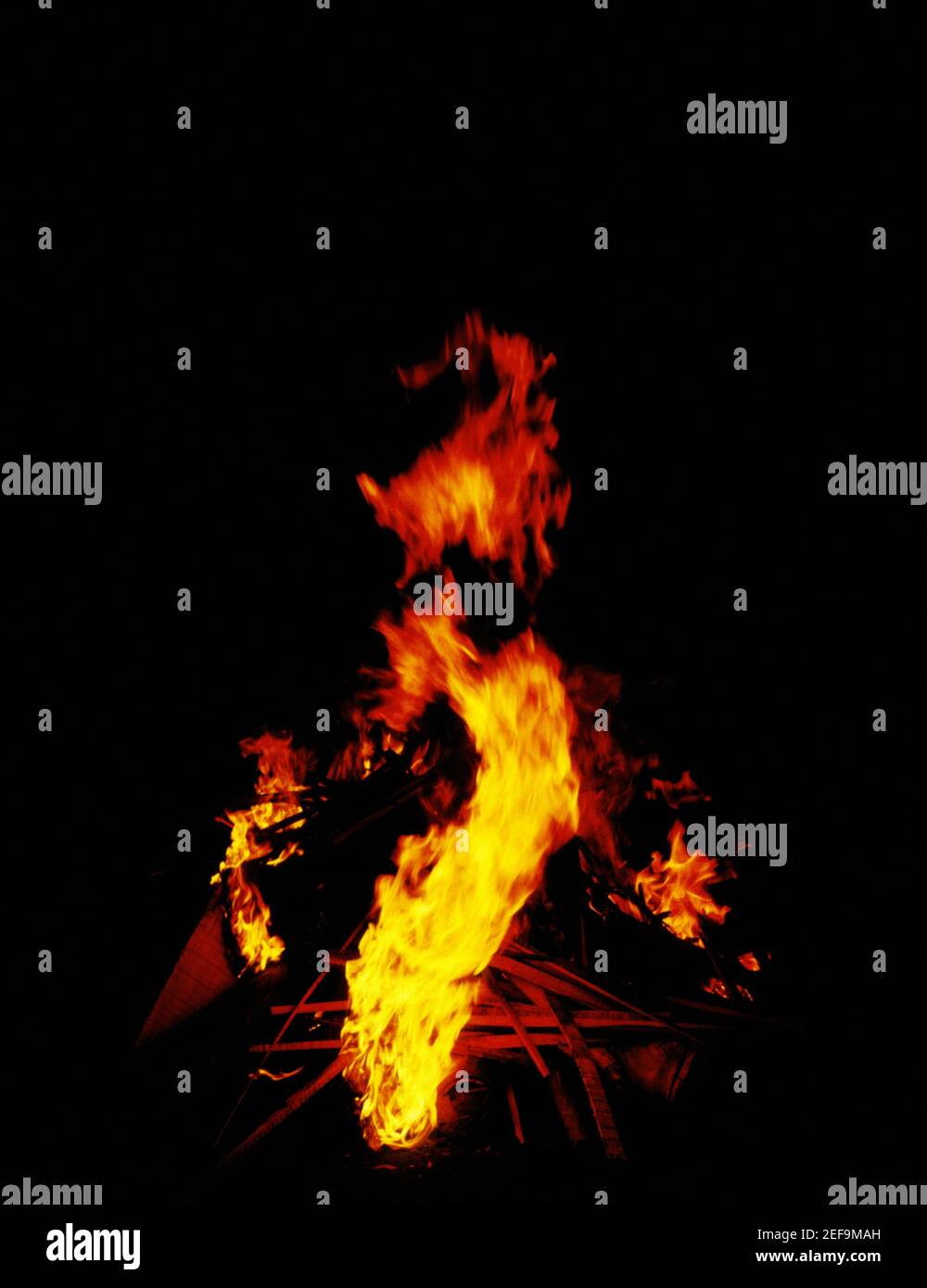 Flames of a fire at night Stock Photo - Alamy