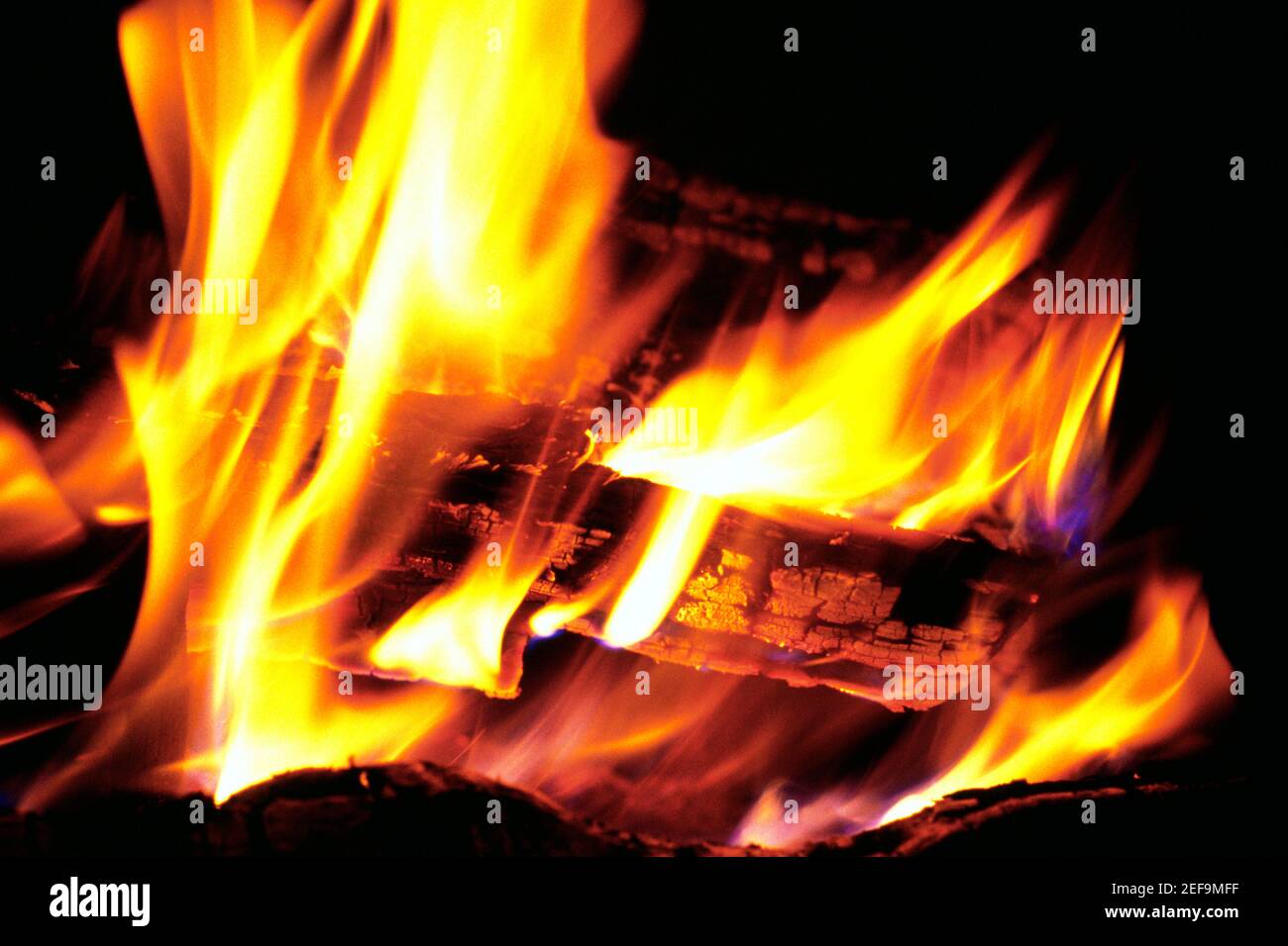 Close-up of a log fire Stock Photo - Alamy