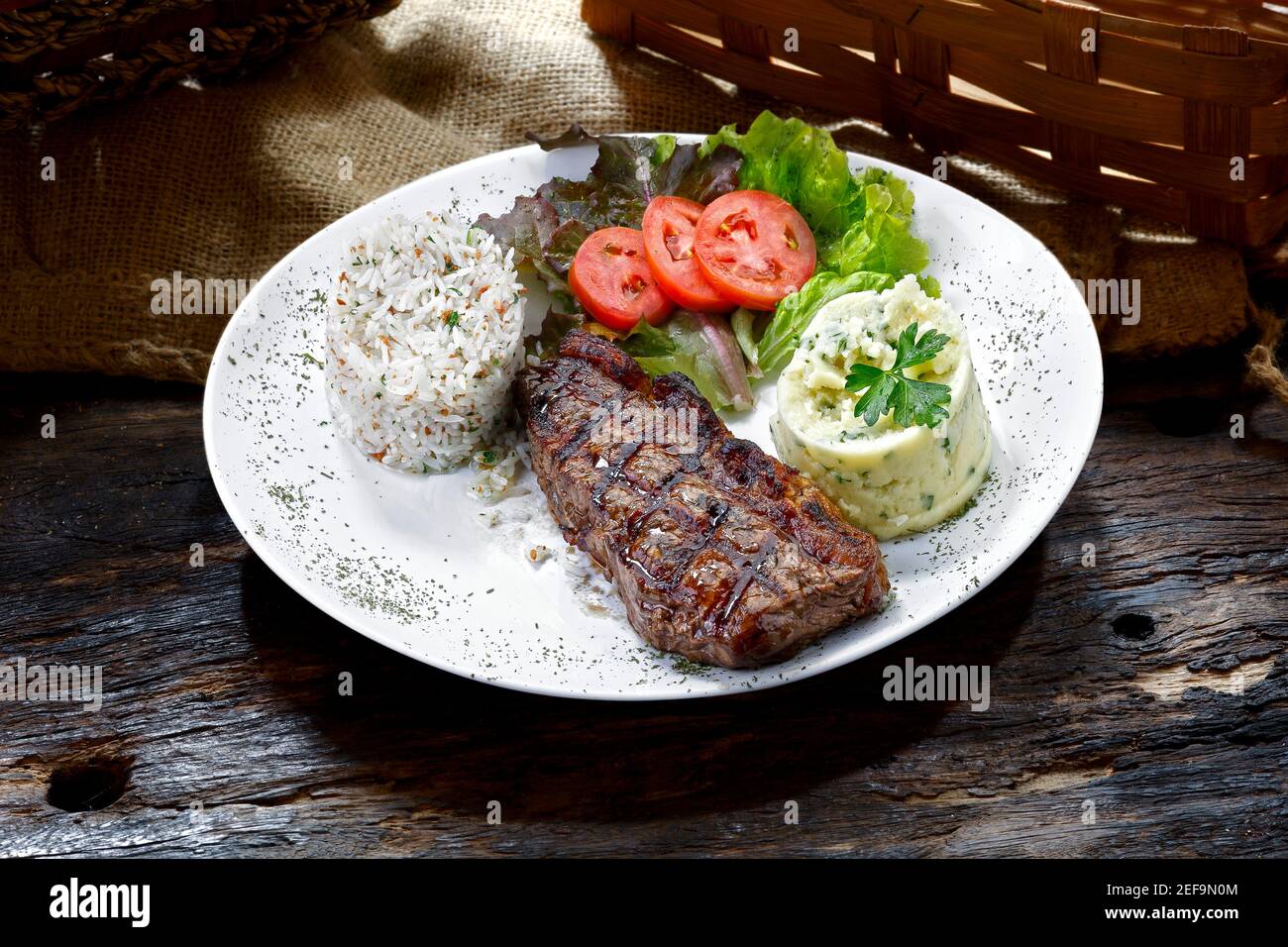 Rice with potatoes and meat Stock Photo - Alamy